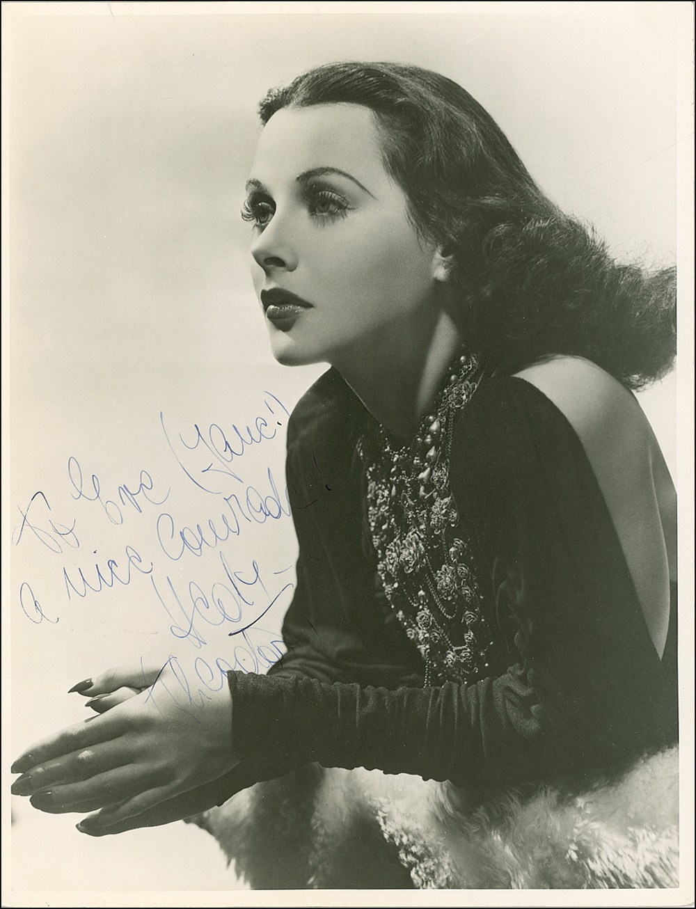 Hedy Lamarr: Signing for her Comrade X costar Eve Arden | RR Auction