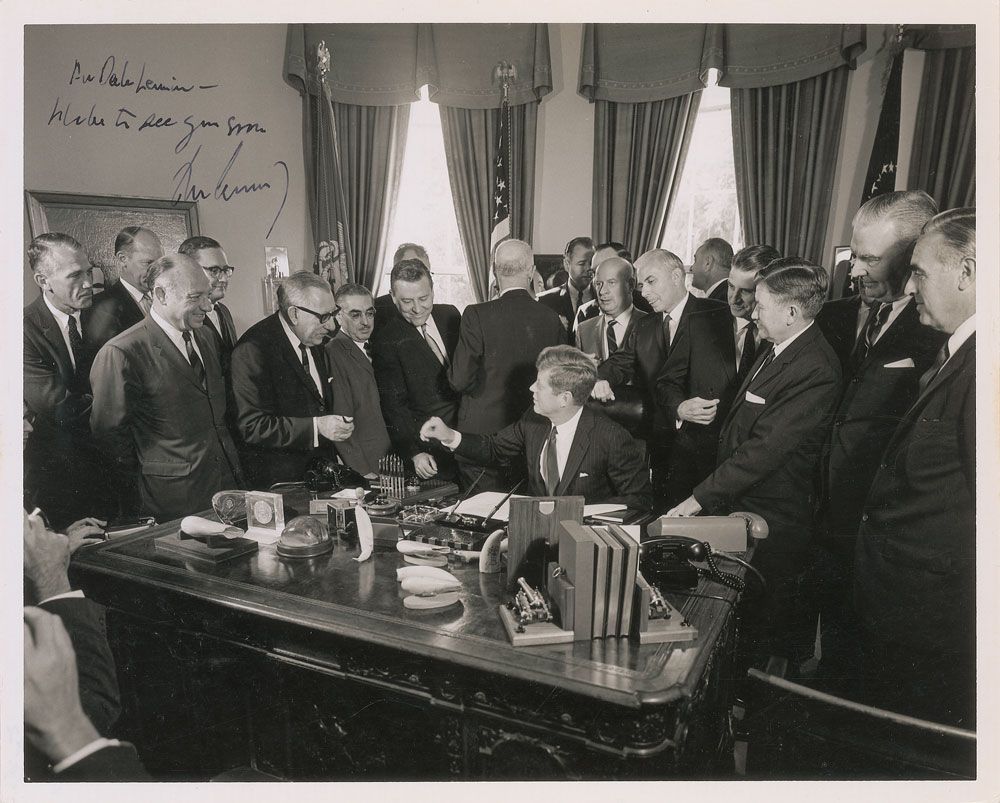 John F. Kennedy: Fantastic photo capturing JFK signing a bill in