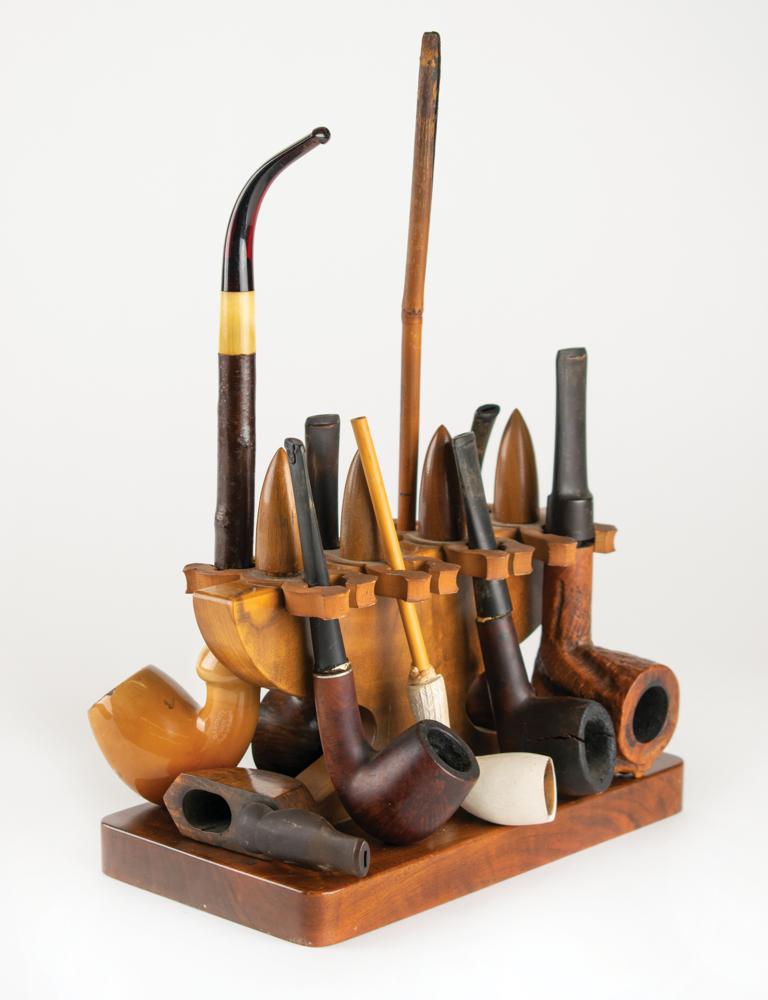 Albert Einstein's (9) Pipes and Menorah Pipe Holder | RR Auction