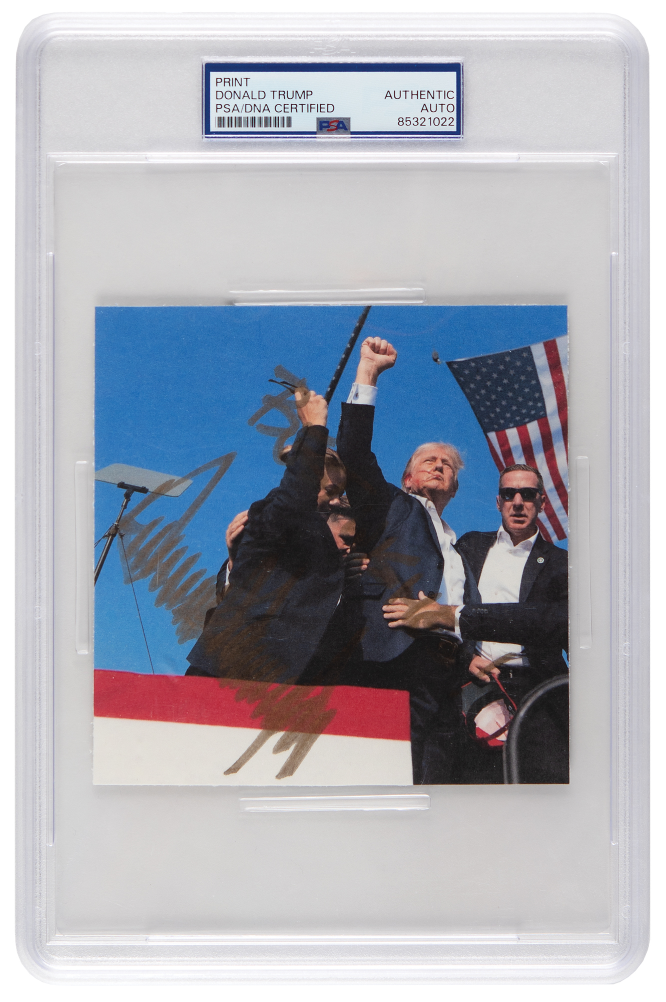 Donald Trump Signed Book Page with 'Raised Fist' Image | RR Auction
