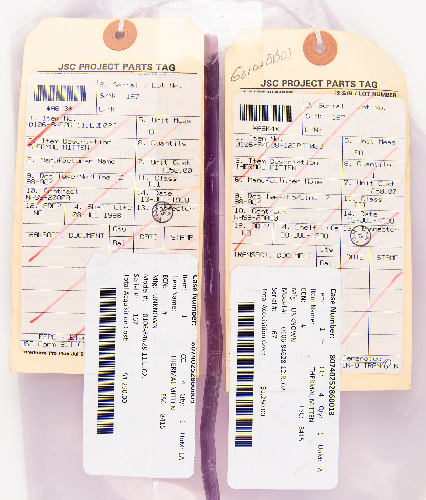 Space Shuttle EVA Thermal Mittens | RR Auction